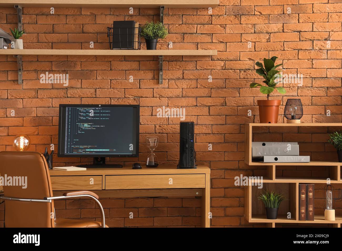 Interior of modern office with programmer's workplace and shelves Stock ...