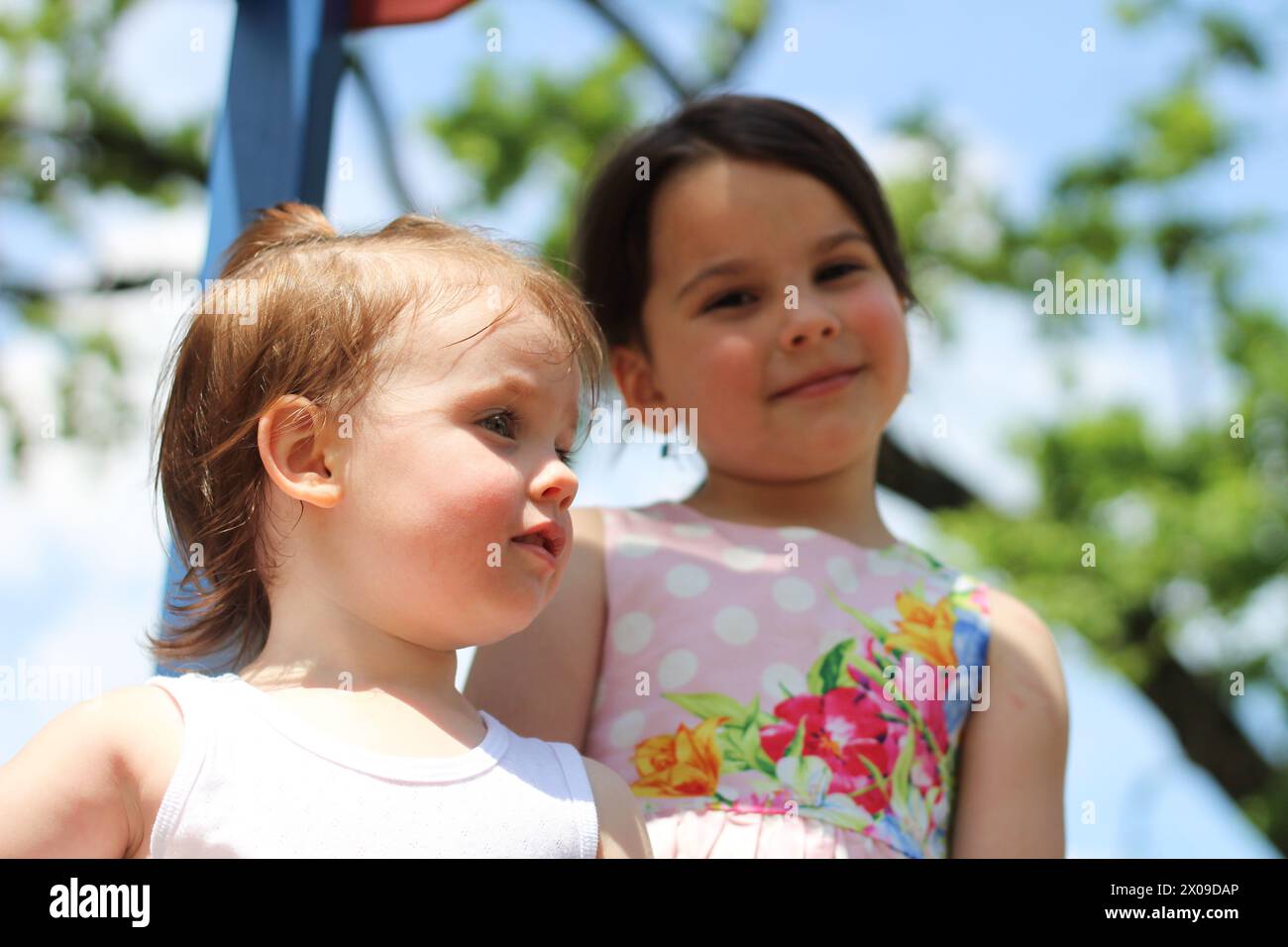 The joyful and carefree spirit of two little girls enjoying their time ...