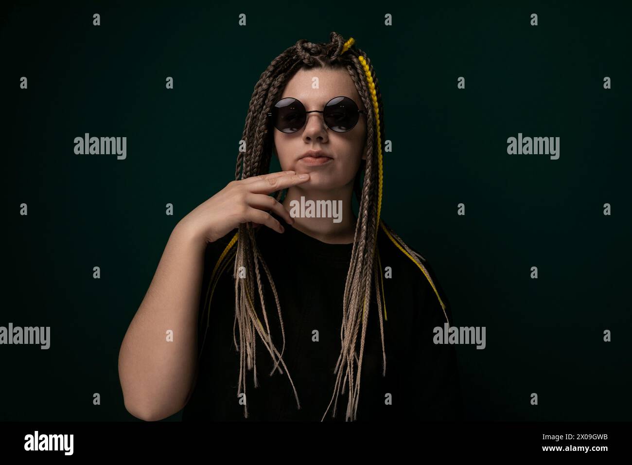 Stylish Woman With Dreadlocks and Sunglasses Poses for Picture Stock ...