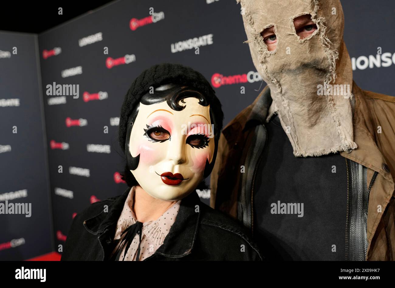 Actors playing the characters "Pin-Up," left, and "Scarecrow" from the ...