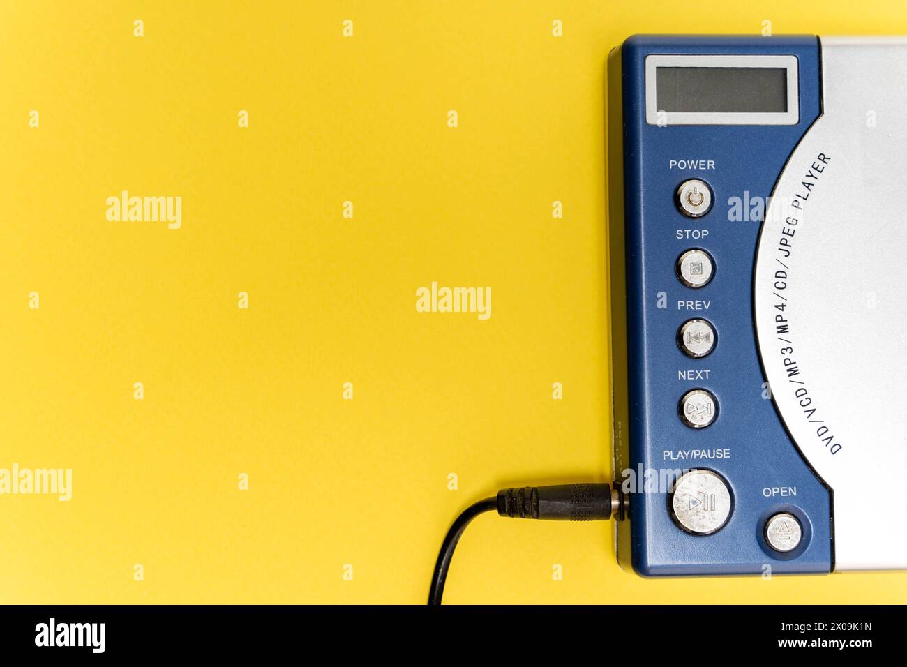 vintage DVD player. An electronic device in blue and white tones stands ...