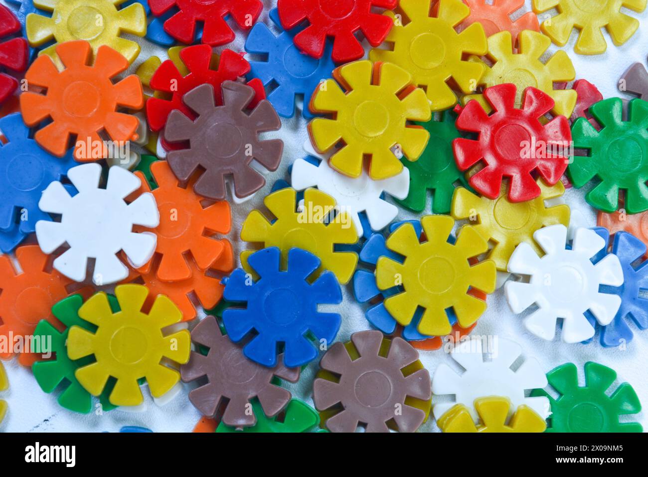 Wooden children's puzzle toy with colorful blocks of different shapes ...