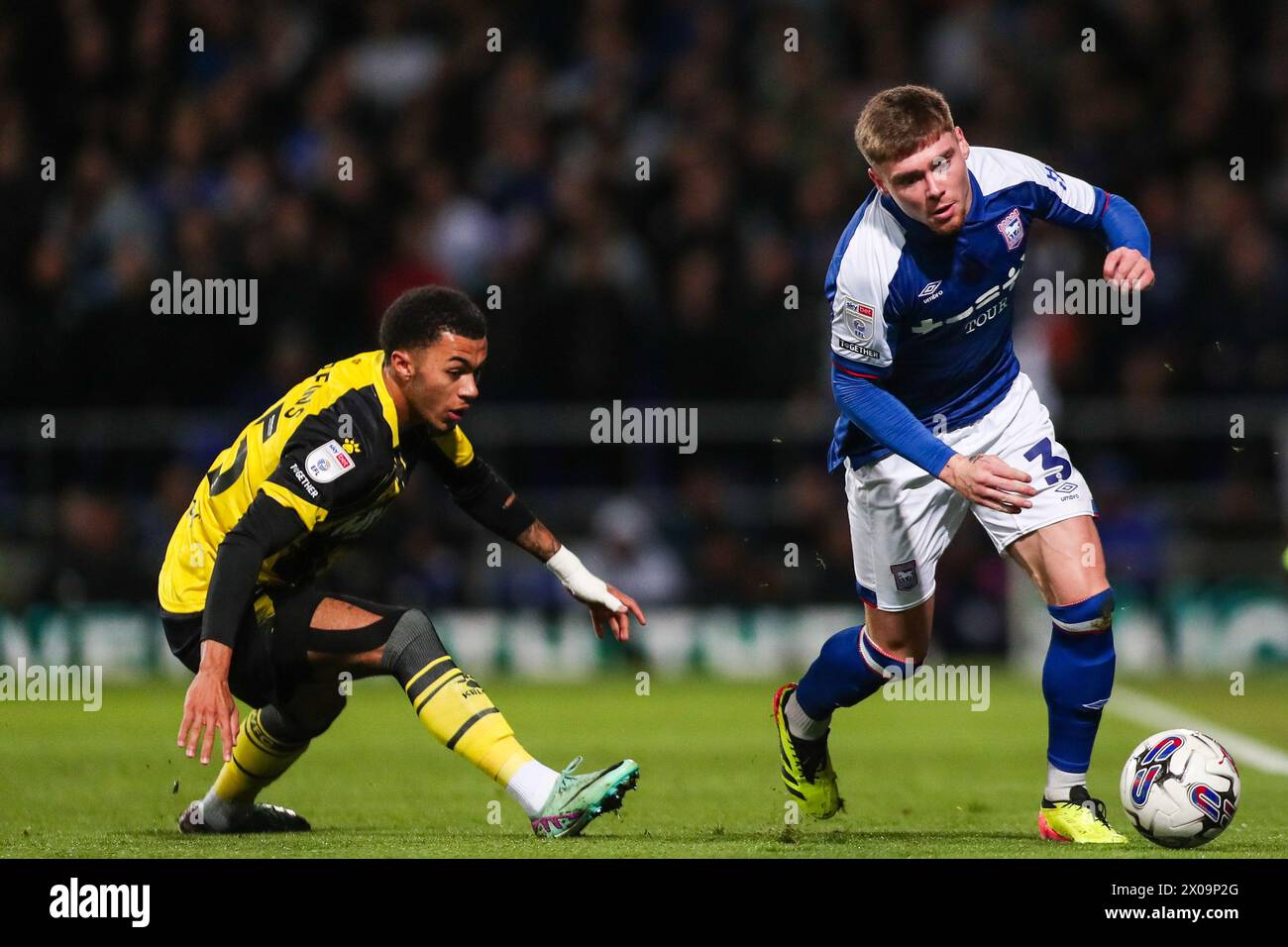 Ipswich, UK. 10th Apr, 2024. Watford's Ryan Andrews battles for the ...