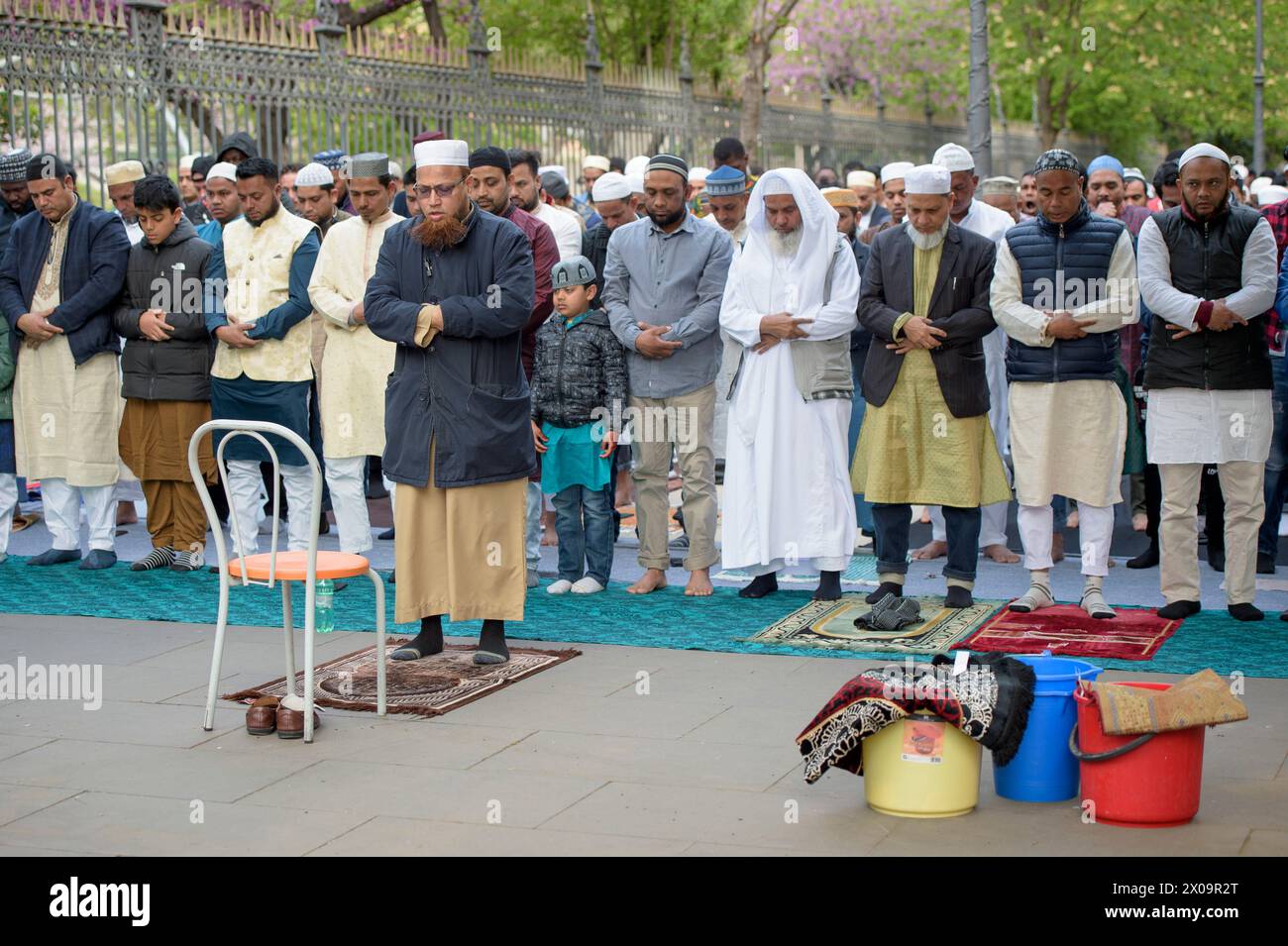 Rome, Italy. 10th Apr, 2024. An Imam leads the prayer of Muslim men on ...
