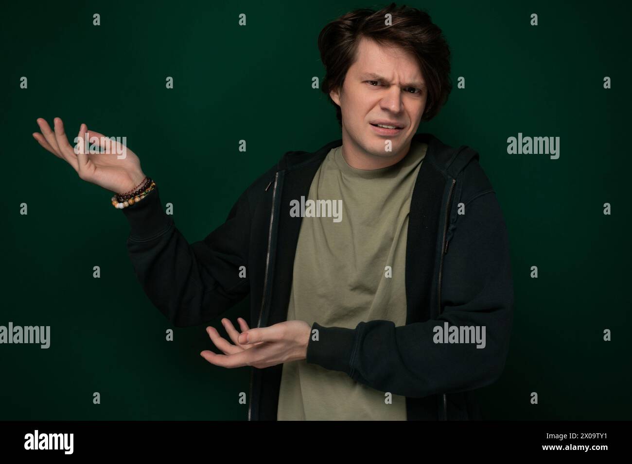 Man in Black Jacket Holding Out Hands Stock Photo - Alamy