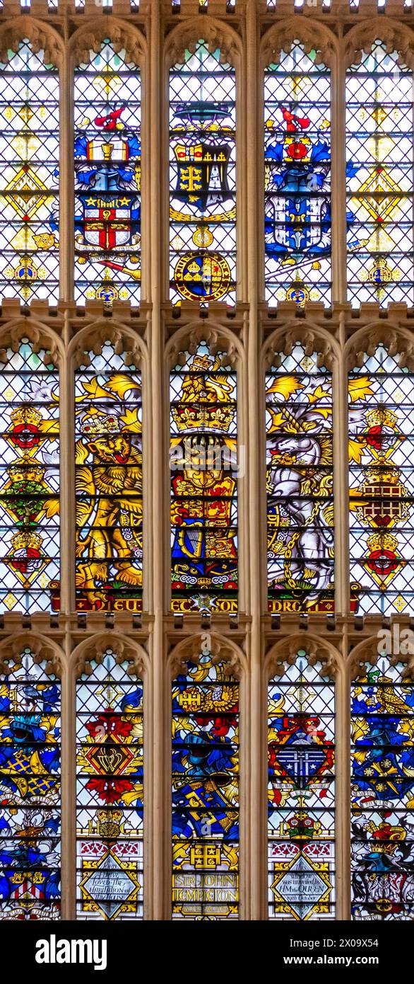 Vertical image of a vibrant stained glass window with intricate ...