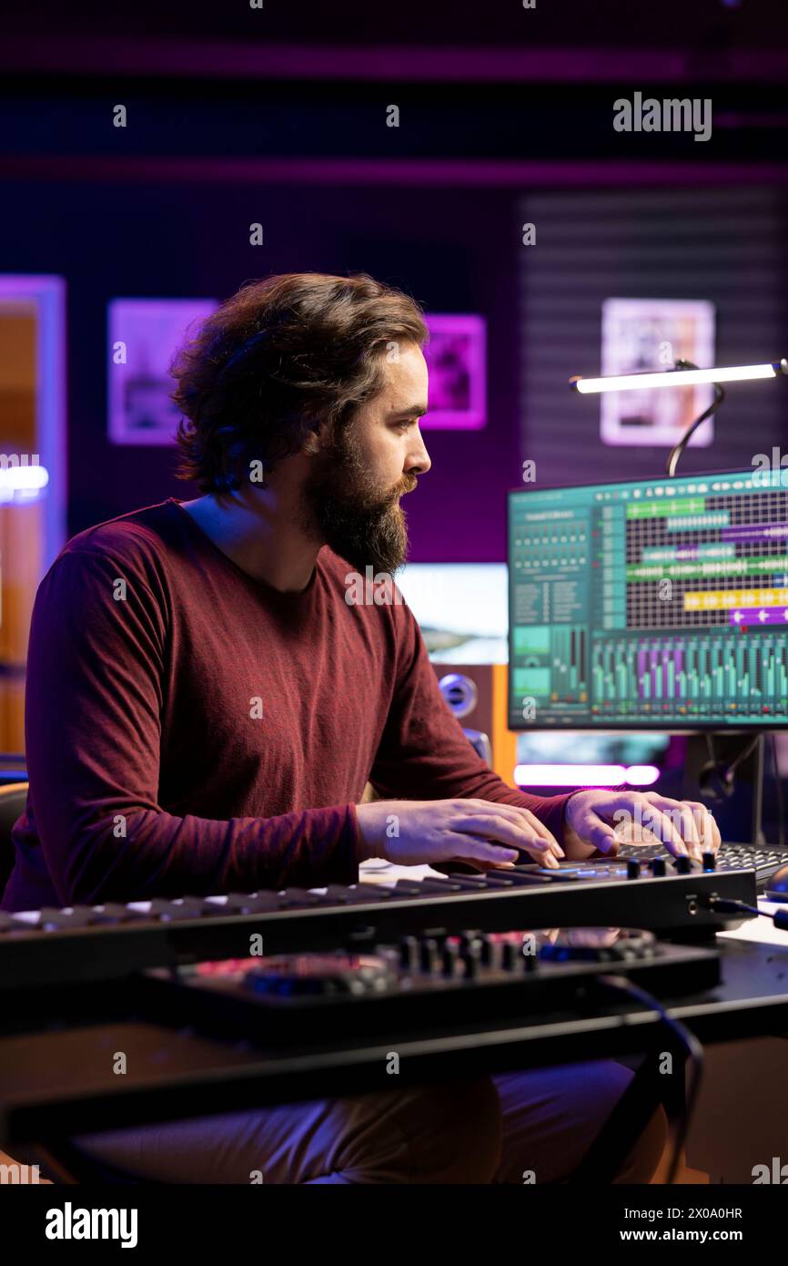 Music producer adding tunes as sound effects for a new soundtrack ... Music producer adding tunes as sound effects for a new soundtrack ...