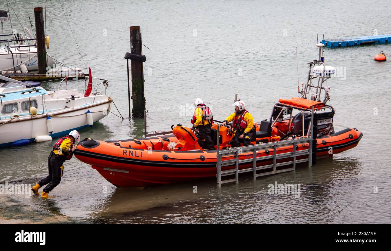 The small RNLI lifeboat going out at Weymouth harbour Stock Photo - Alamy