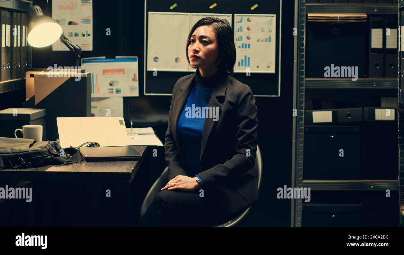 Detective looks at holographic images captured in real time, police ...