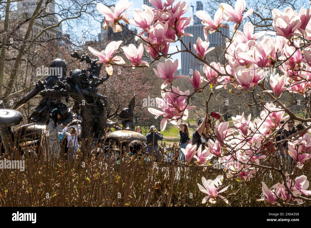 The Alice in Wonderland sculpture of the tea party is surrounded by ...