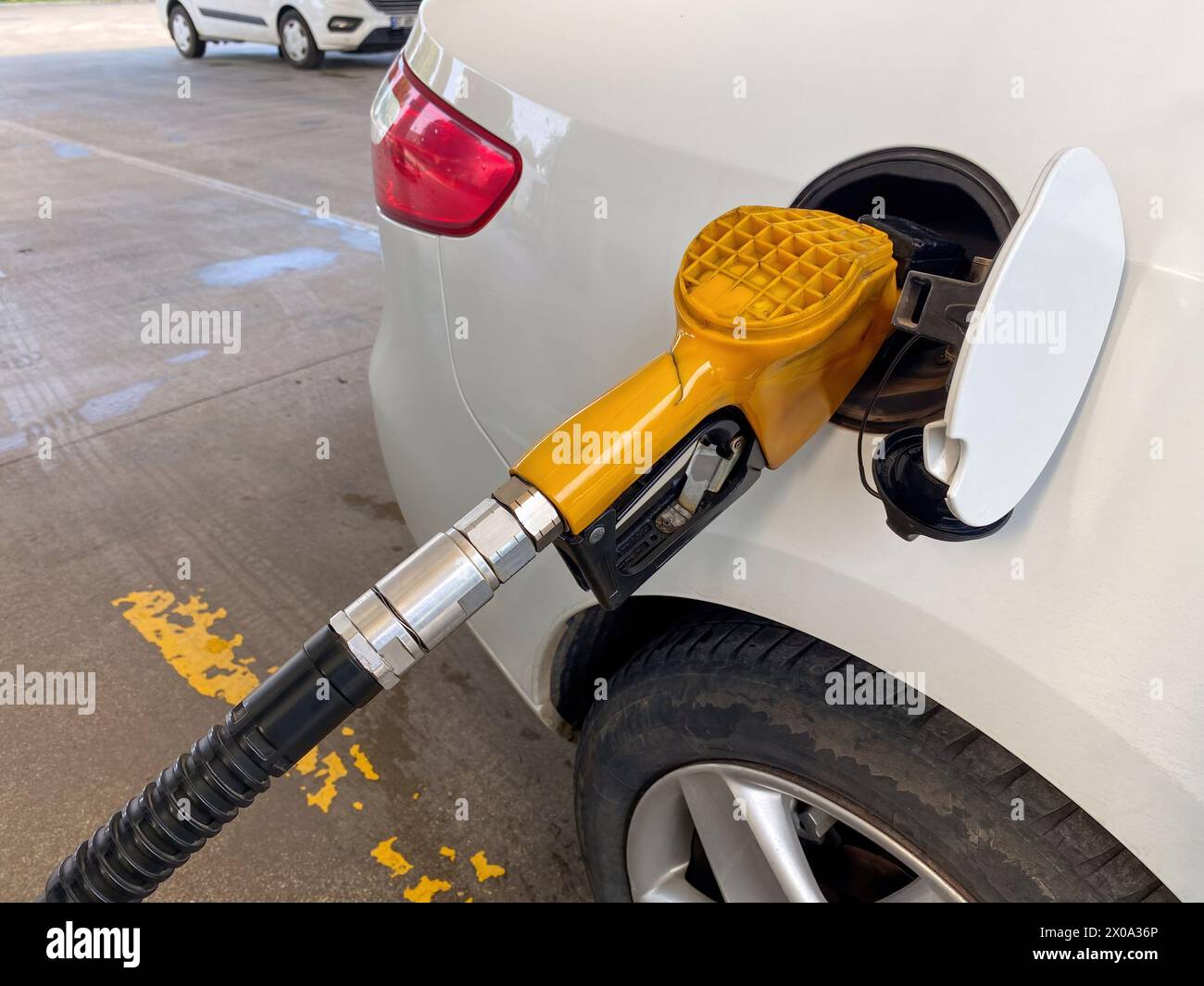 Human hand filling automobile fuel tank. fuel pump in Turkey Stock ...