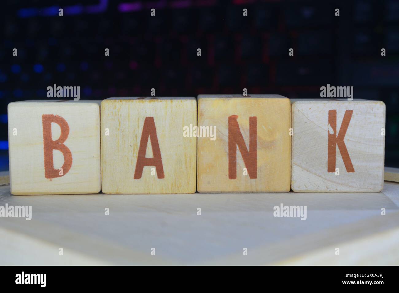 Wooden alphabet blocks isolated on white with sentence "BANK Stock ...