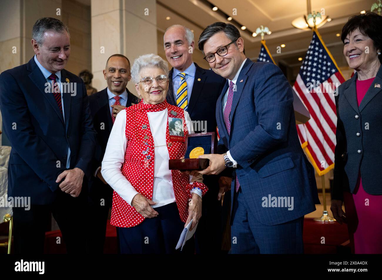 Mae Krier, an award recipient and a “Rosie”, accepts the Congressional ...