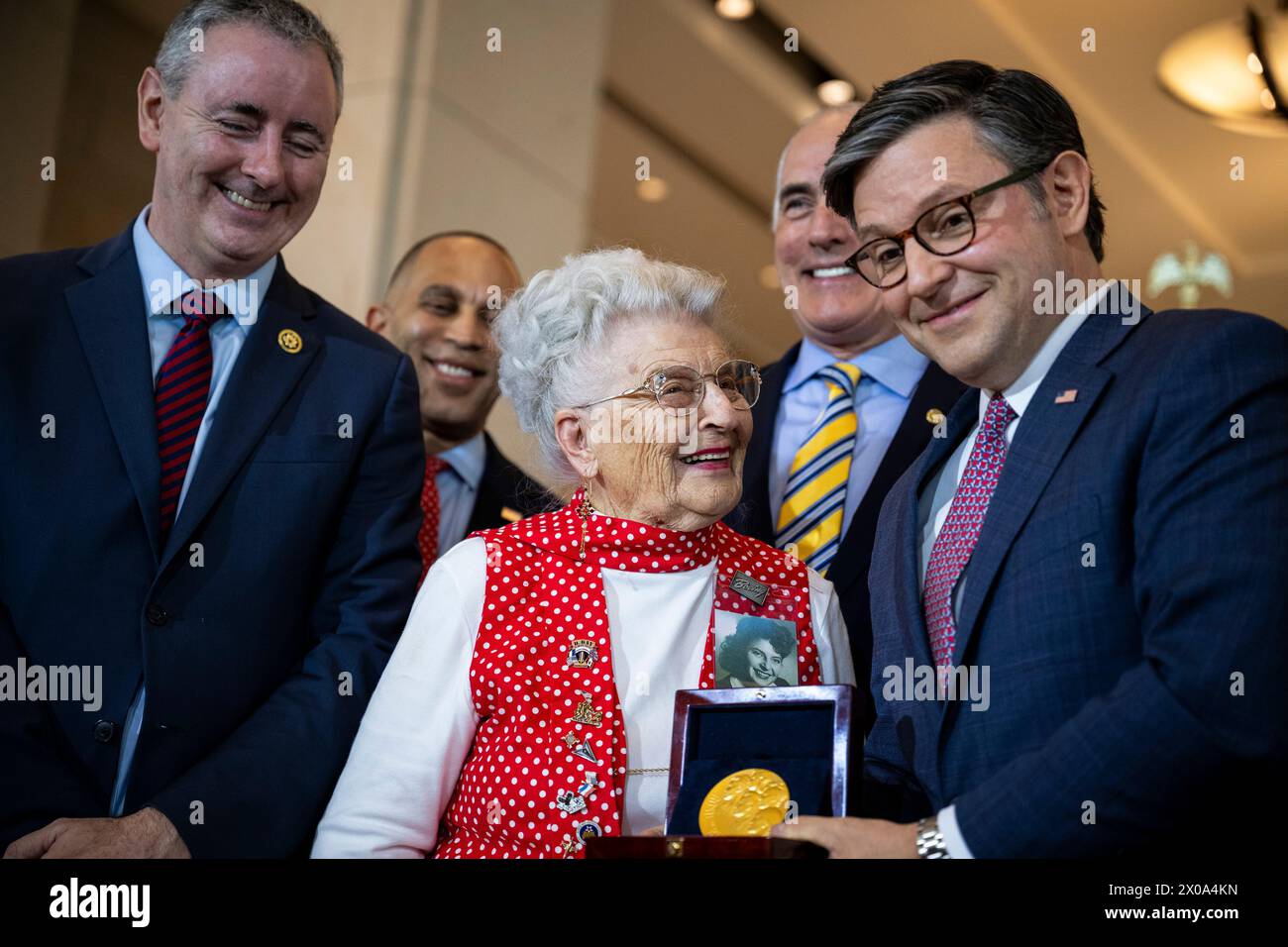 Mae Krier, an award recipient and a “Rosie”, accepts the Congressional ...
