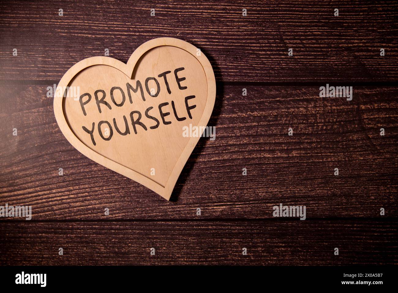 PROMOTE YOURSELF text Stock Photo - Alamy