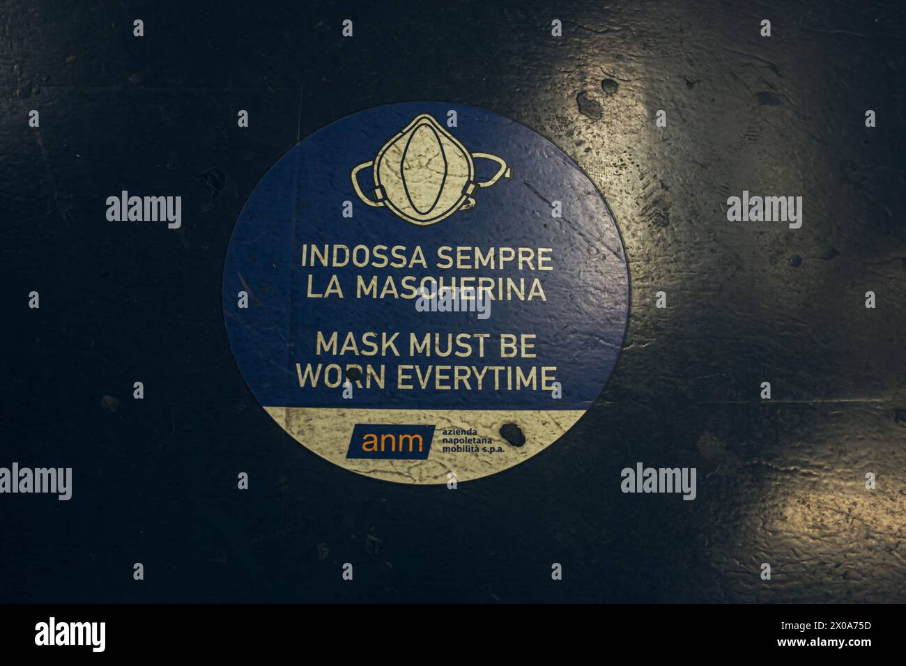 Mandatory mask information poster in Naples, Italy Stock Photo - Alamy