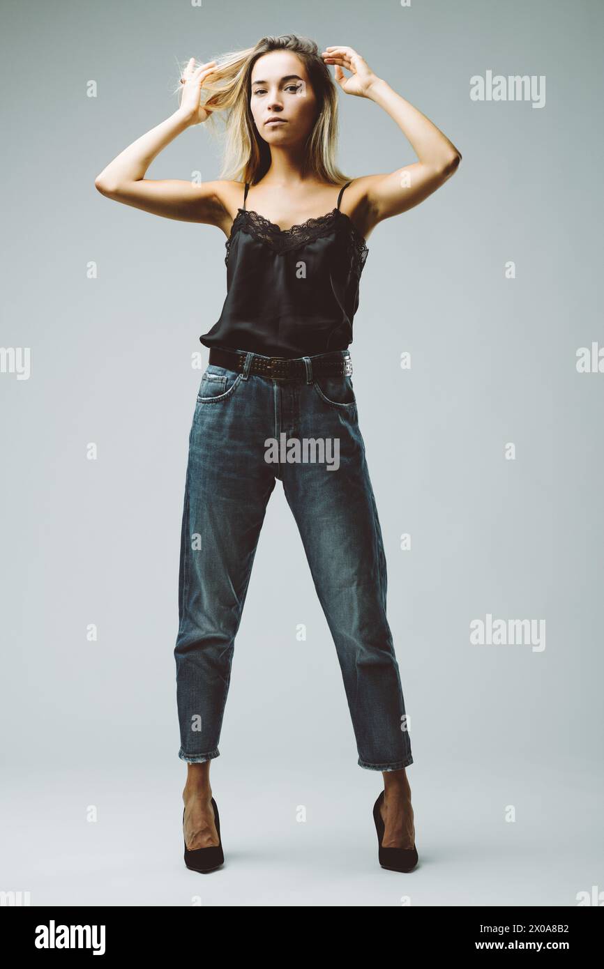 Stylishly attired in lace and denim, she embodies a carefree spirit ...