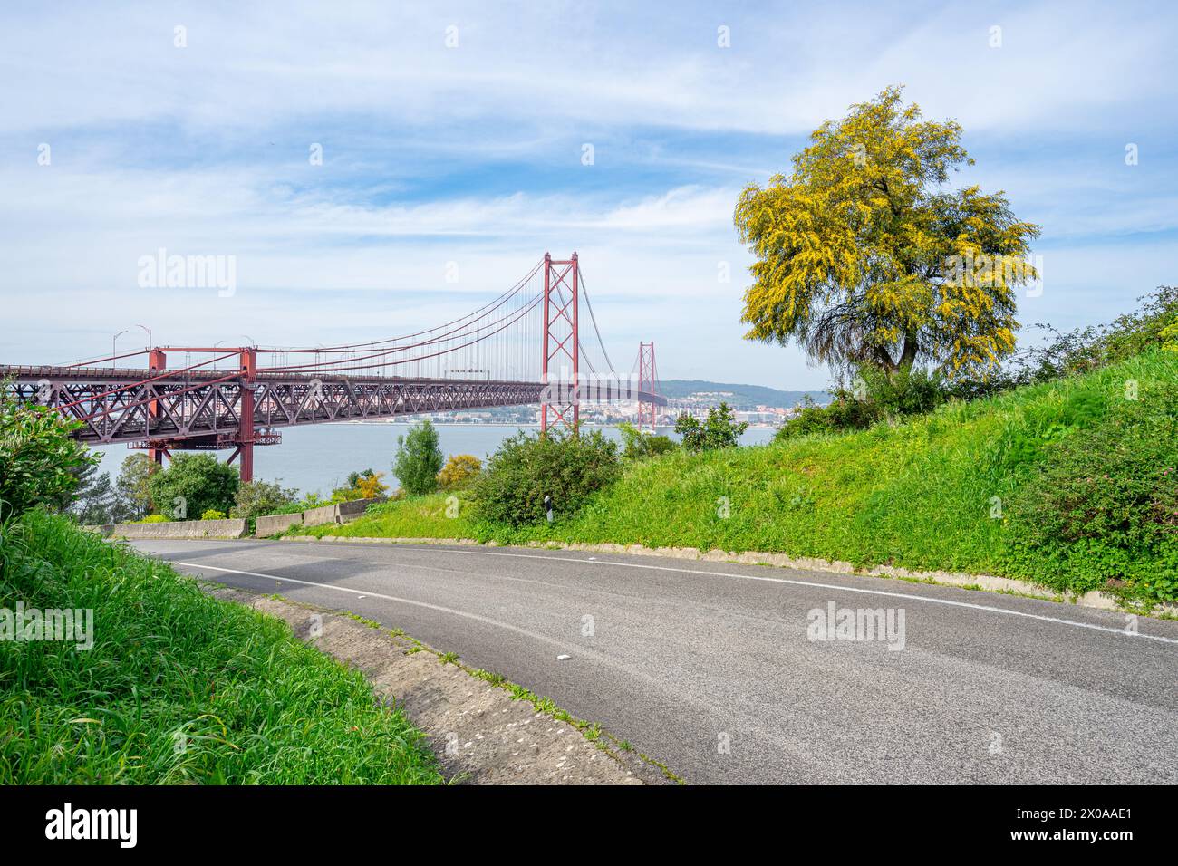 25 de Abril bridge, or Salazar bridge seen from Almada to Lisbon ...