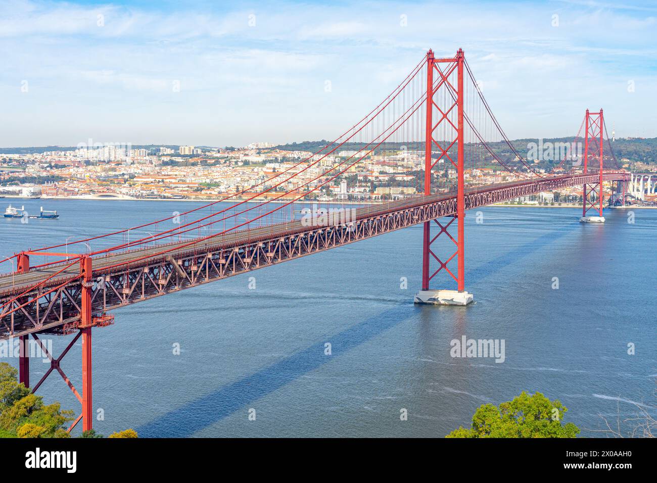 25 de Abril bridge, or Salazar bridge seen from Almada to Lisbon ...