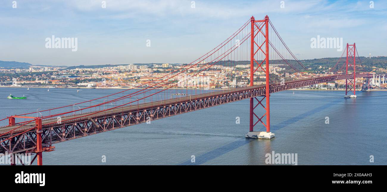 25 de Abril bridge, or Salazar bridge seen from Almada to Lisbon ...