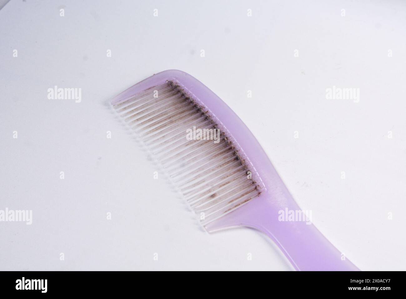 Very dirty comb and a lot of hair fall out Stock Photo - Alamy