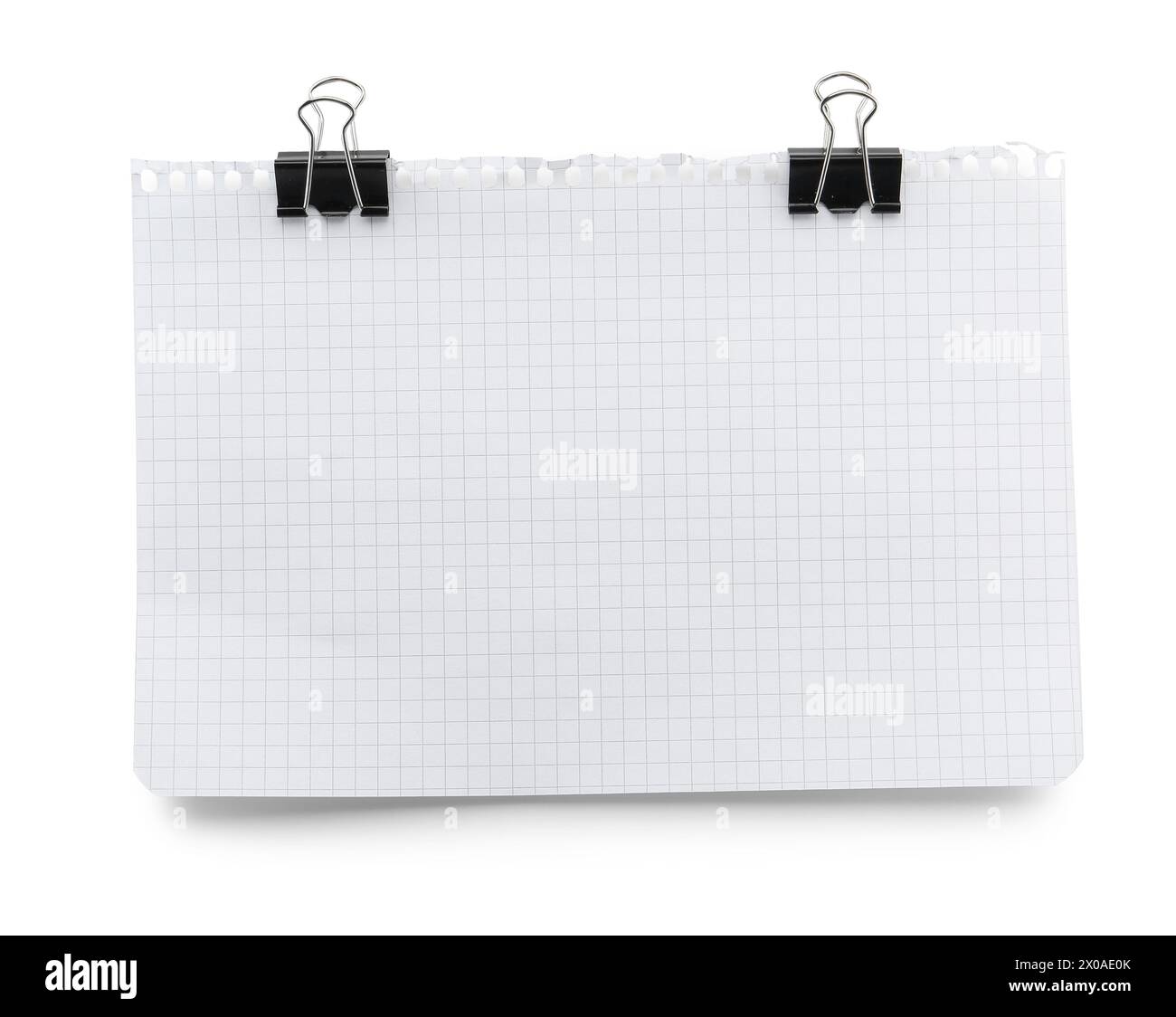 Checkered notebook sheet with binder clips isolated on white, top view ...