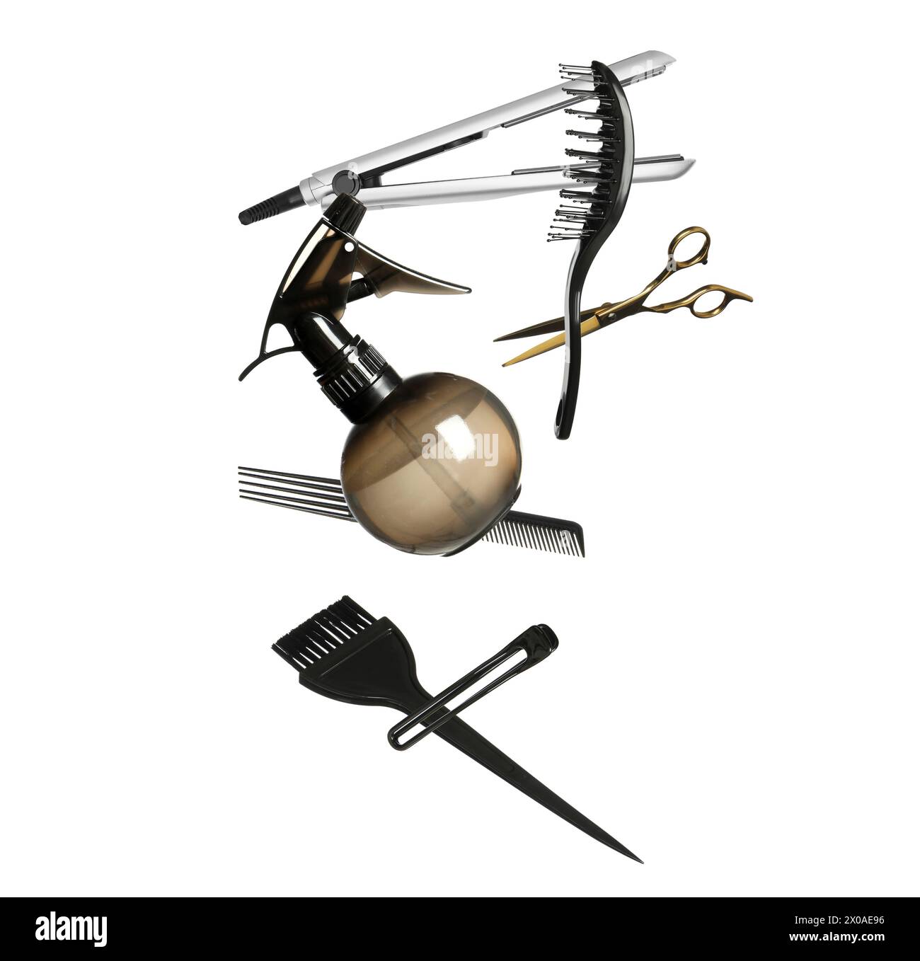 Professional hairdresser tools falling on white background Stock Photo ...