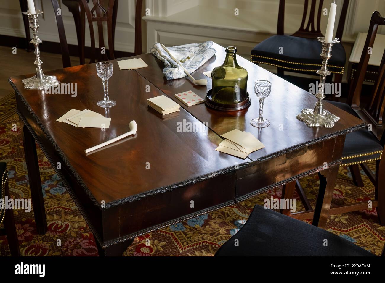 Table with cards and pipes inside the Governors Palace, Colonial ...