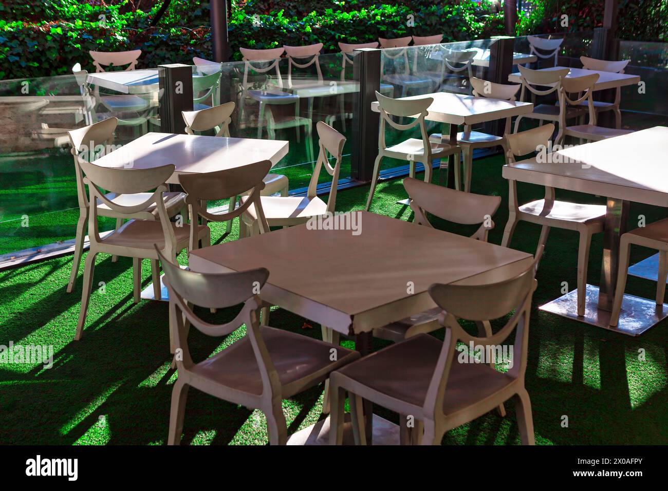 Seats and tables at restaurant. Empty terrace of a restaurant Stock ...