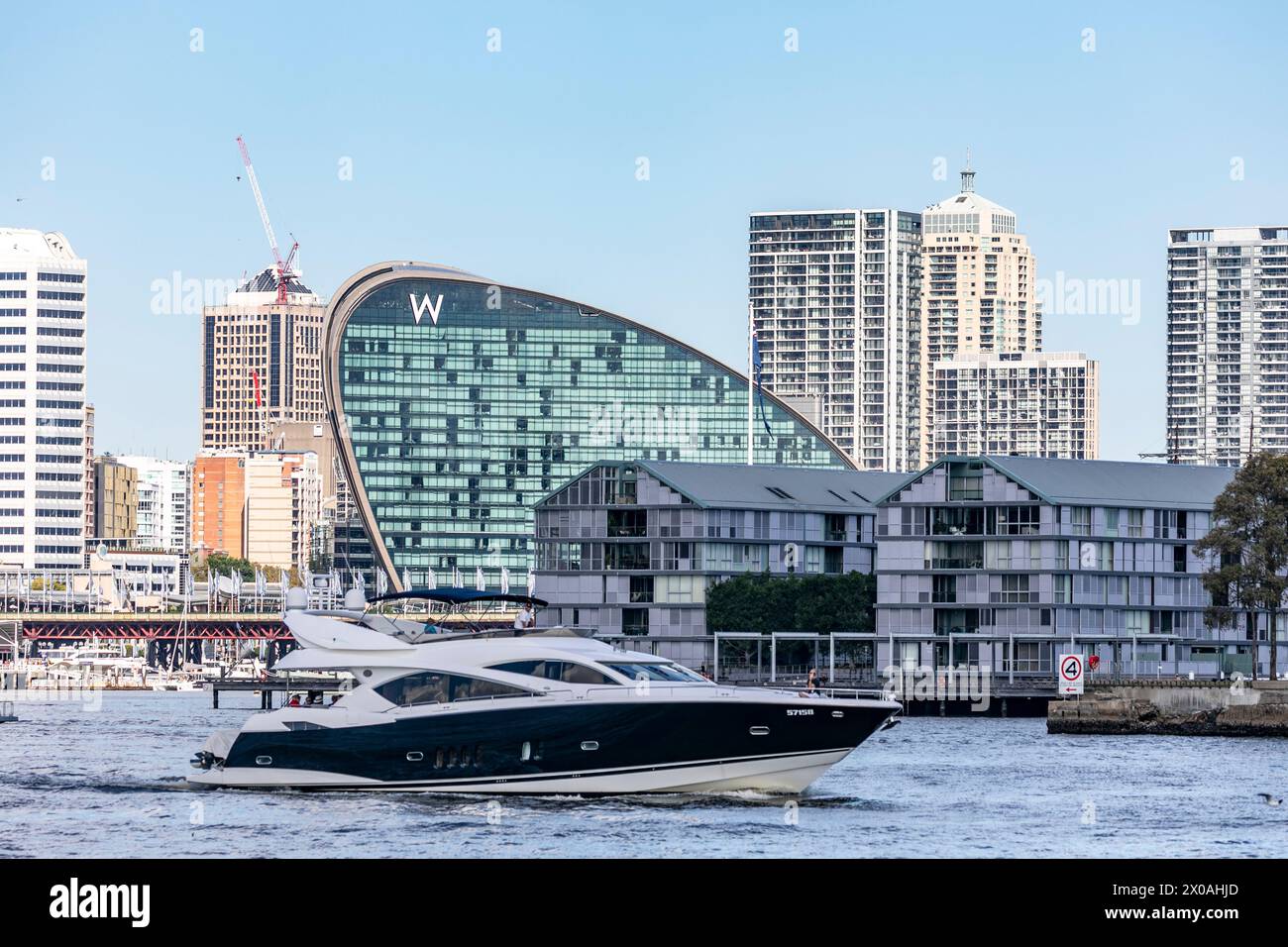 Darling harbour Sydney, luxury motor yacht in front of the Ribbon ...