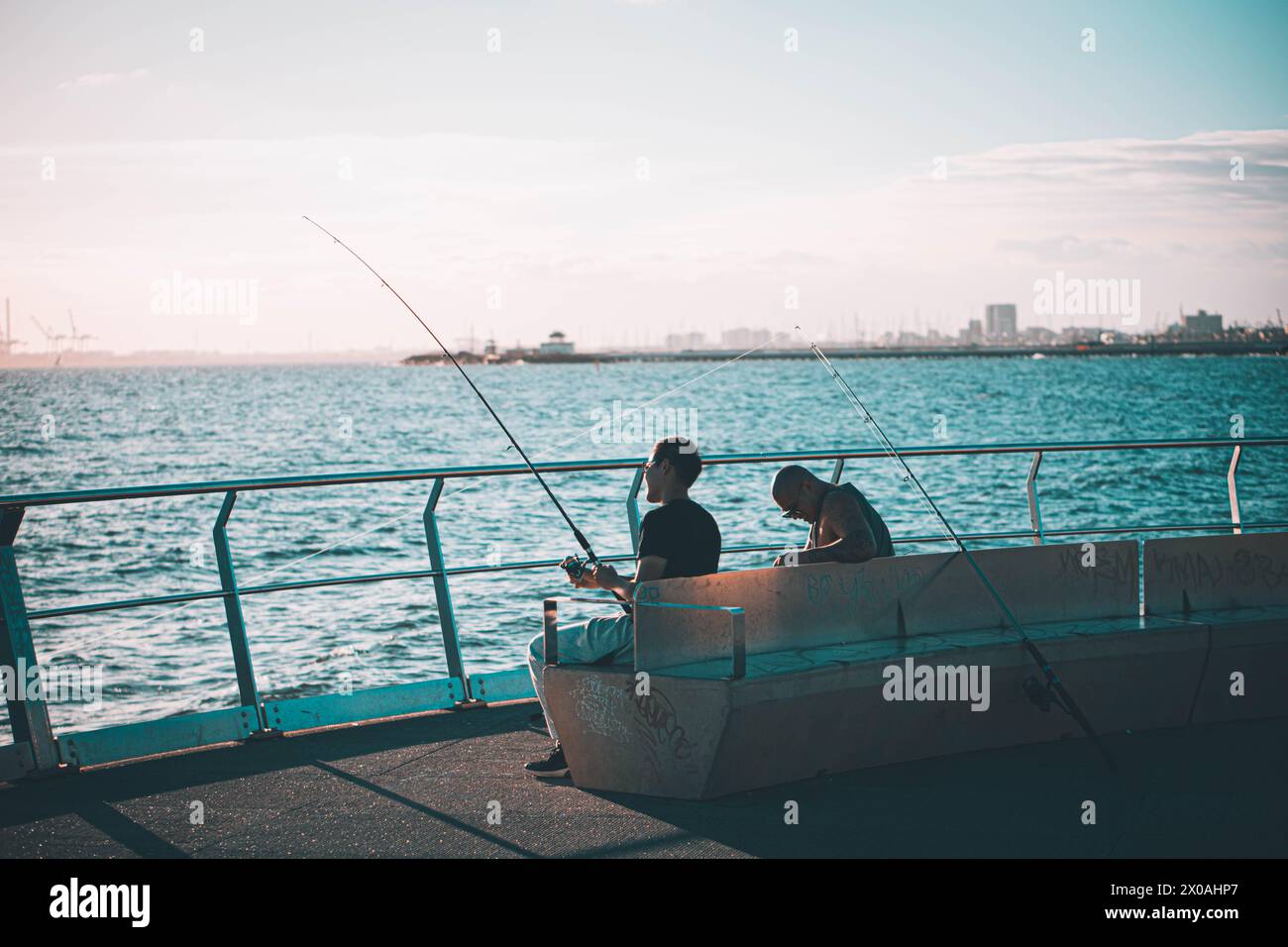 Sunset hunting at st kilda beach Stock Photo - Alamy