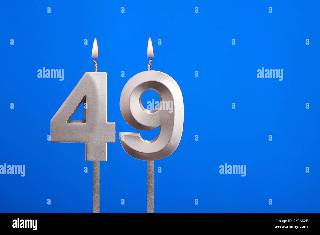 Birthday candle number 49 - Celebration card on blue background Stock ...