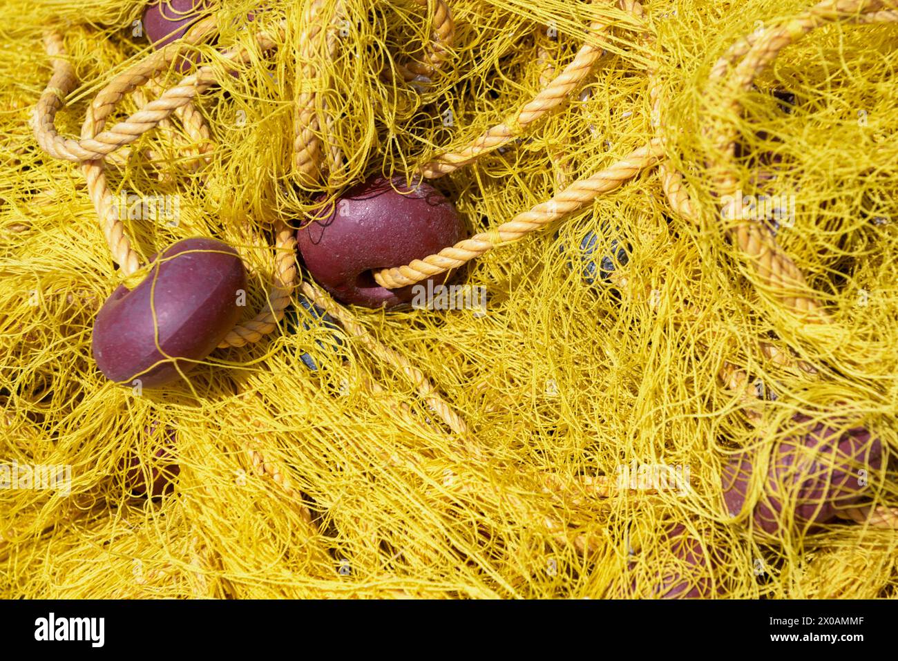 Yellow fishing net Stock Photo - Alamy