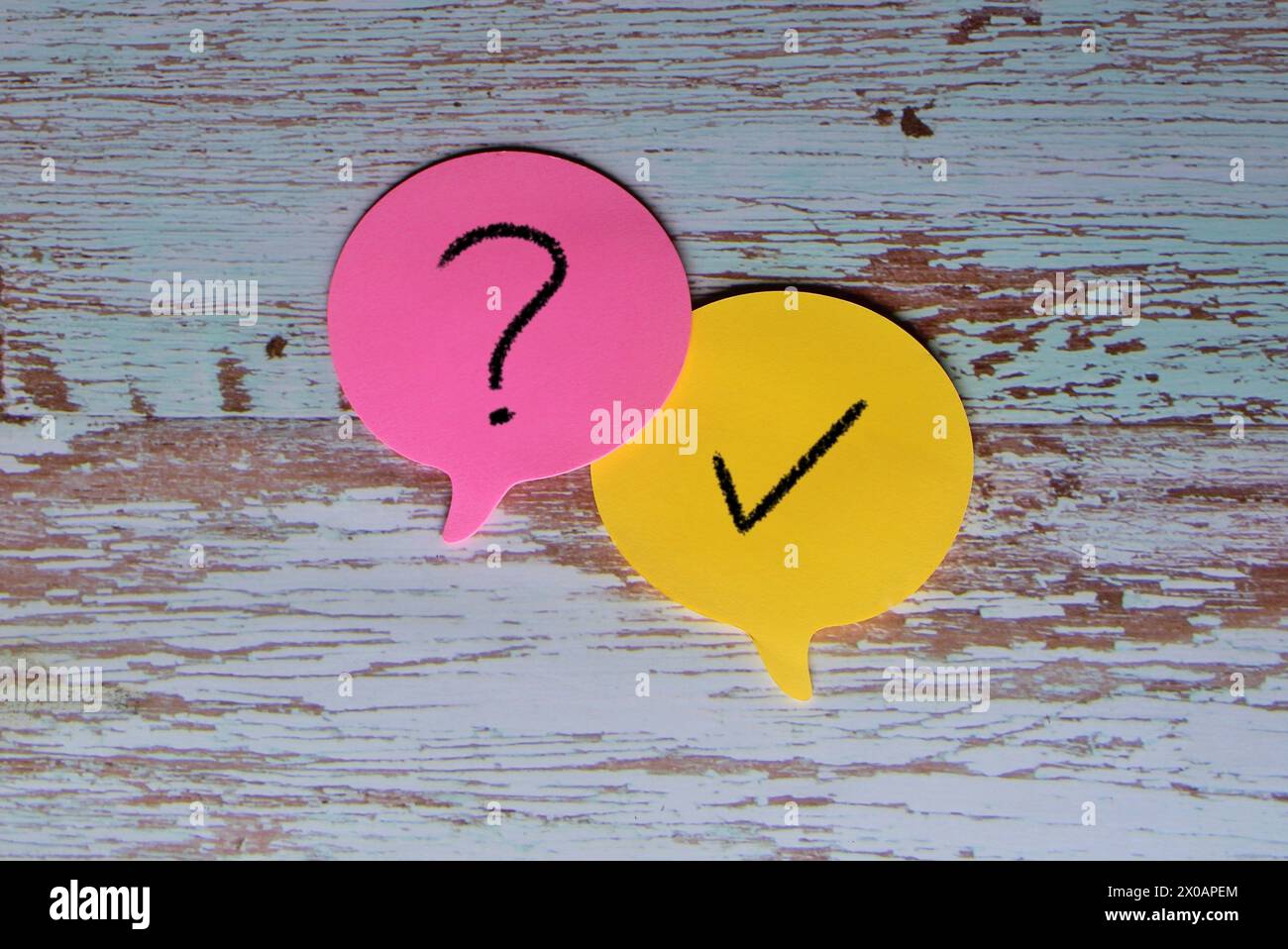 Speech bubble with question mark and a tick icon. Asking question and ...