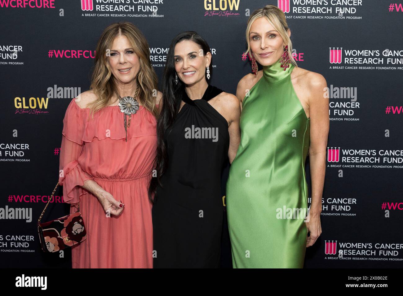 Rita Wilson, from left, Demi Moore and Jamie Alexander Tisch arrive at ...