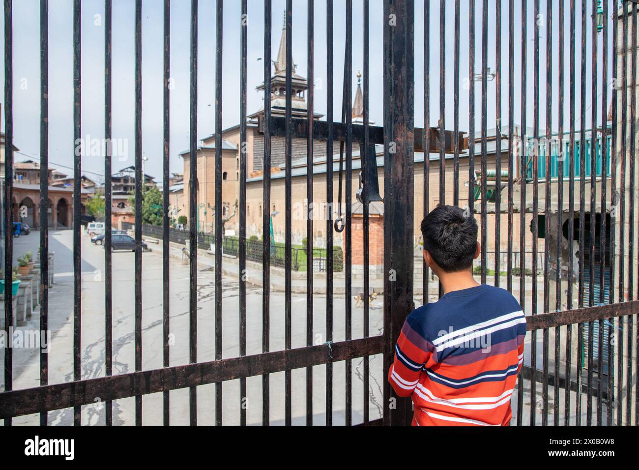 Srinagar, India. 10th Apr, 2024. A Kashmiri boy looking towards the ...