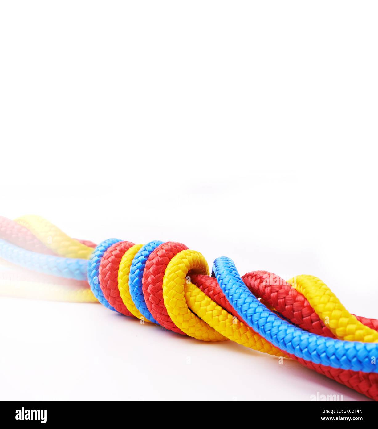 Rope, color and knot together by white background for support with ...