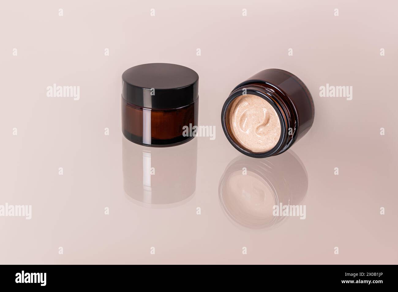Closed and open jars with cosmetic cream for face and body skin care on ...