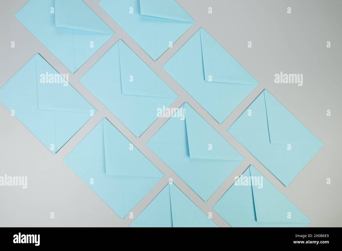 Top view of blue envelopes on grey background. Post flat lay. Copy ...