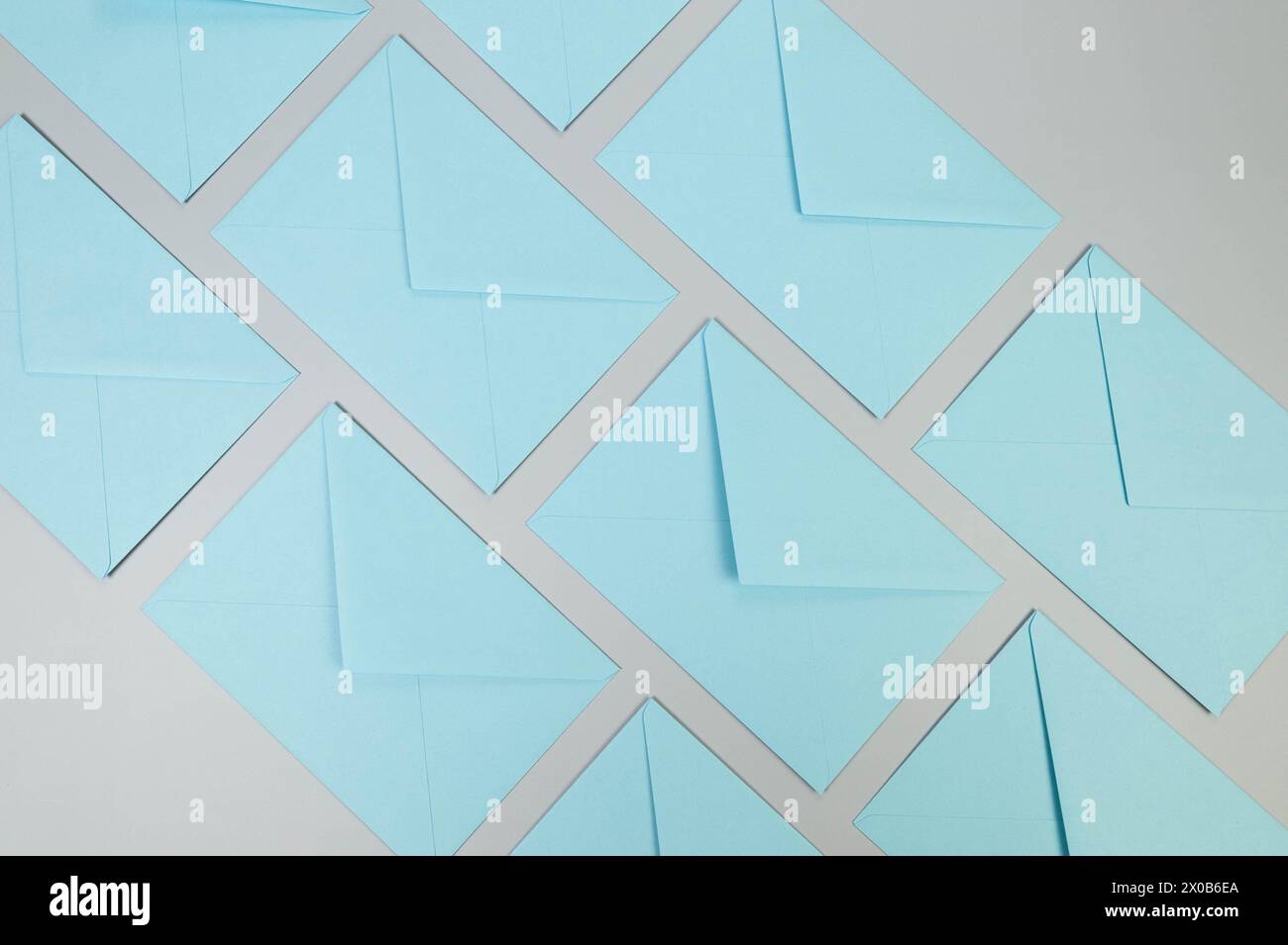 Top view of blue envelopes on grey background. Post flat lay. Copy ...