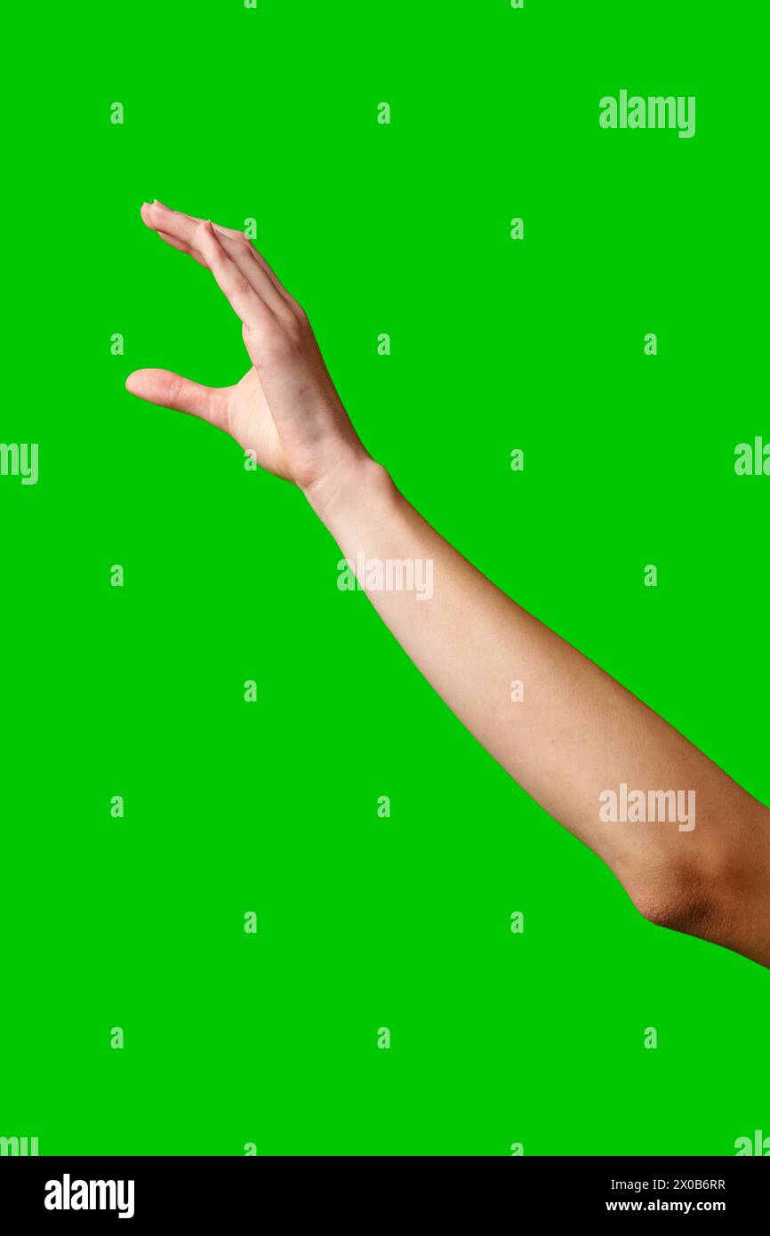 A womans hand extends upward into the air, fingers outstretched ...