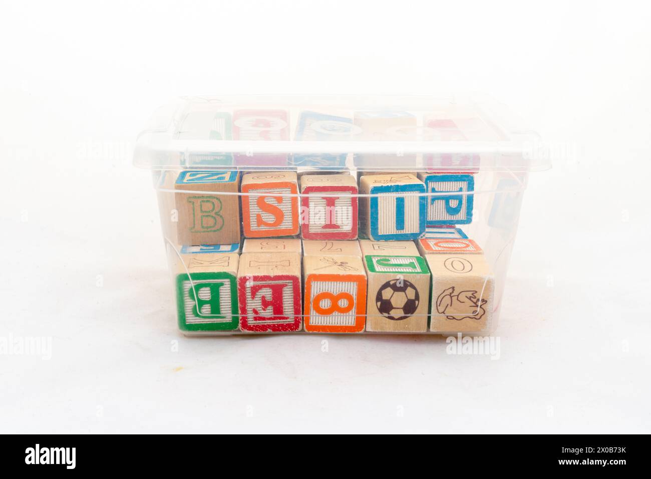 Alphabets wooden blocks in a box Stock Photo - Alamy