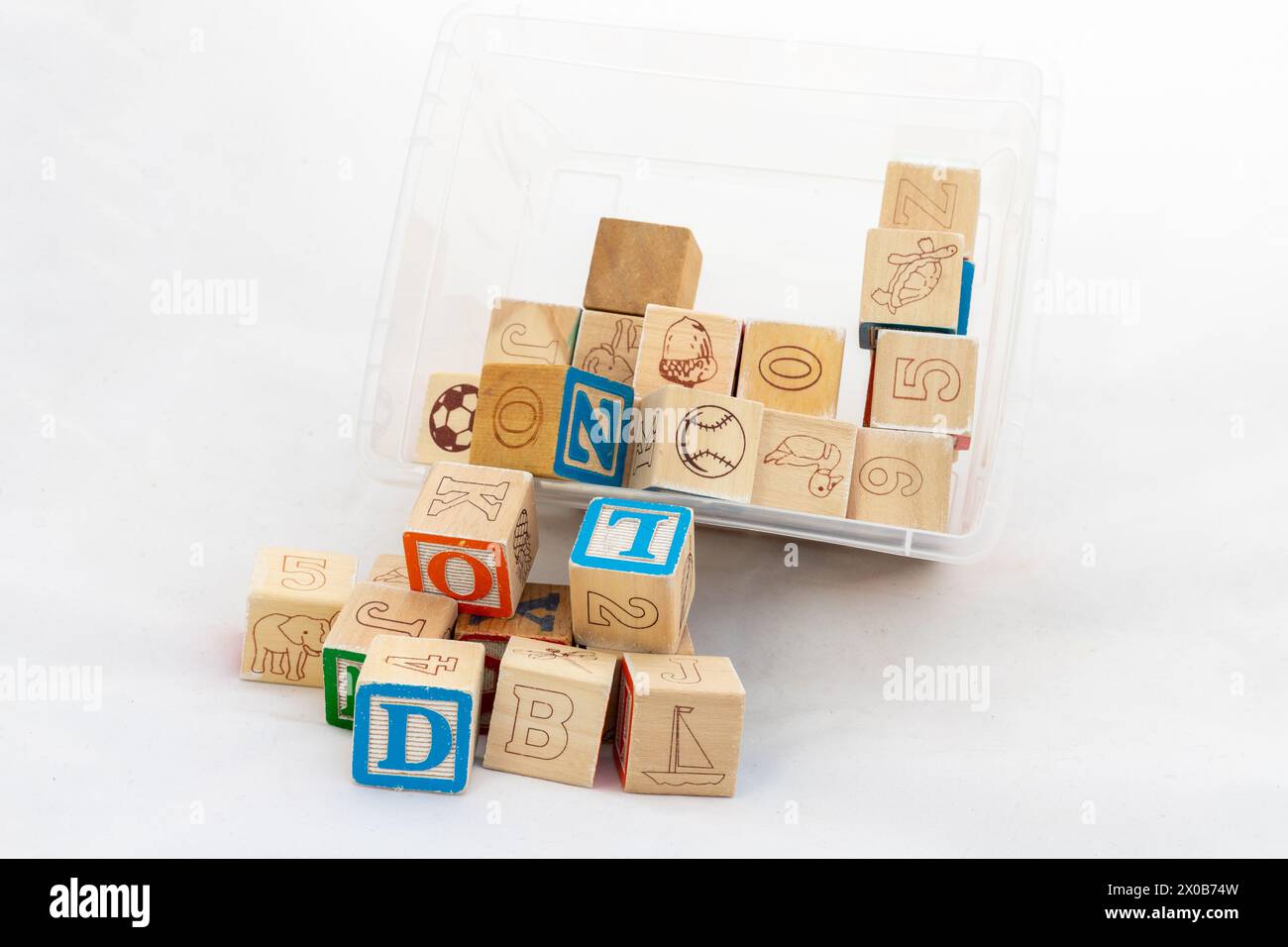 Alphabet blocks scattered on white background. Concept of back to ...