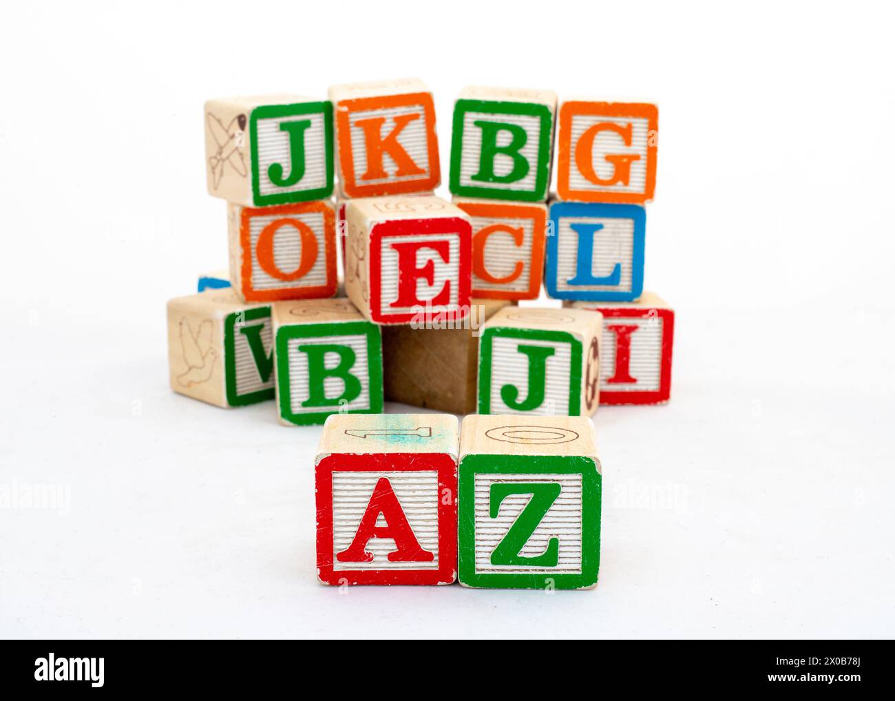 Wooden toy cubes with letters. Alphabet A and Z are in focused and the ...