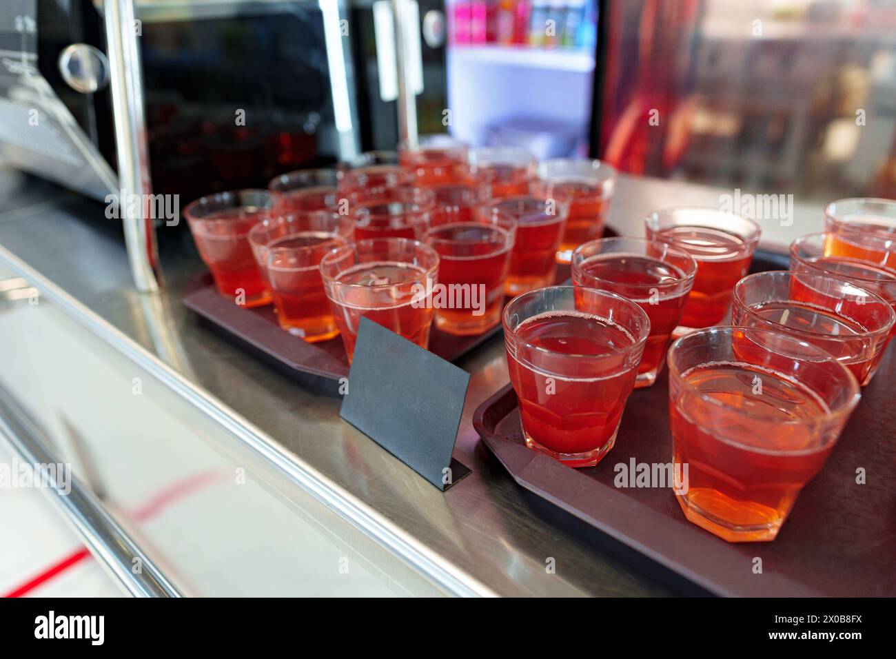 Colorful Array of Fruit Juice Cups on a Serving Cart in a Cafeteria ...