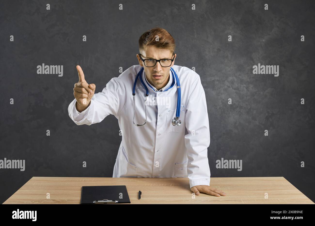 Angry pointing doctor hi-res stock photography and images - Alamy