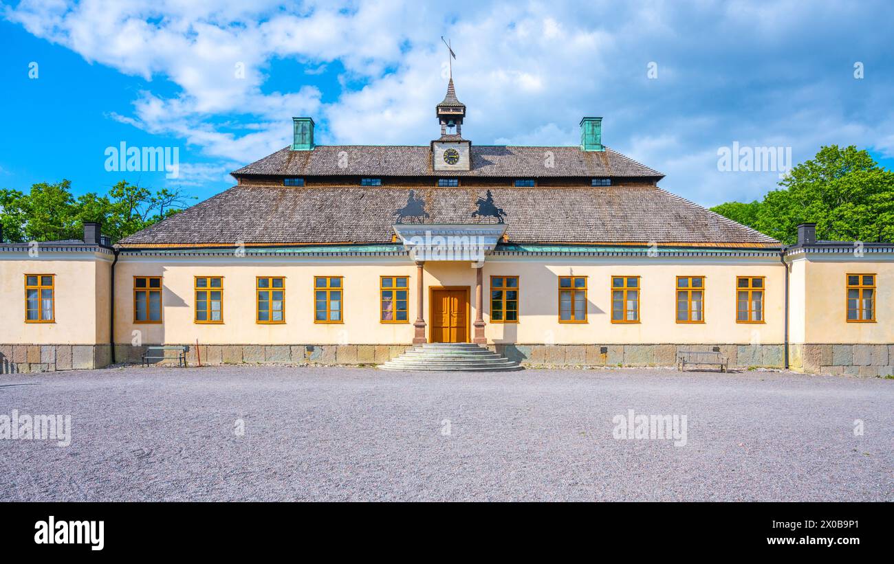Skogaholm Manor stands proudly under a bright blue sky, showcasing its ...