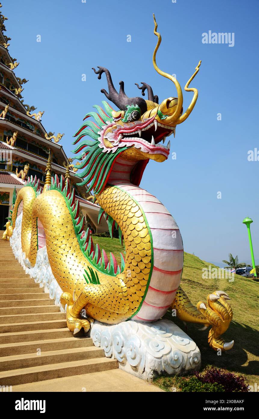 Sculpture ancient chinese dragon statue on stairs for thai people ...