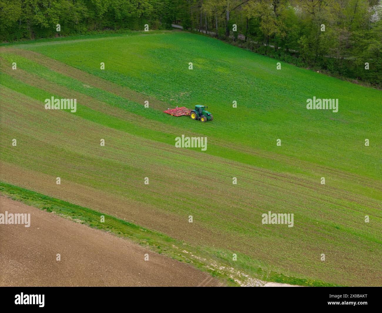 Tractor with cultivator hi-res stock photography and images - Alamy