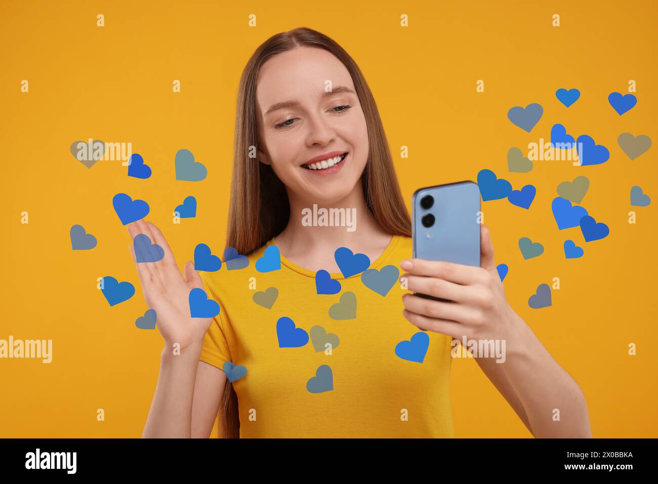 Long distance love. Woman video chatting with sweetheart via smartphone ...